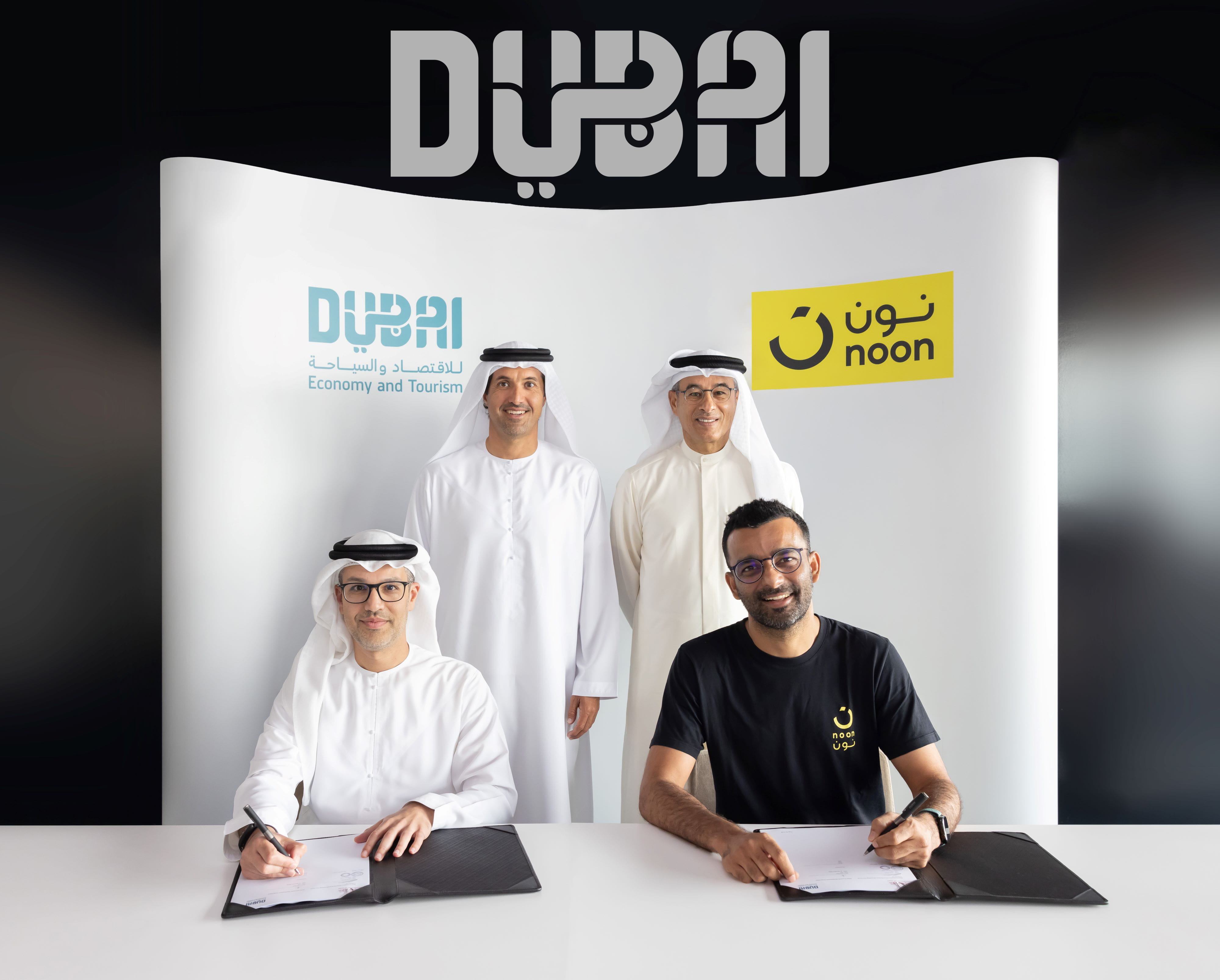 Dubai Department of Economy and Tourism and noon sign pioneering e ...